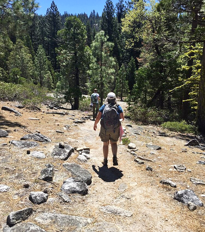 The path less traveled becomes the story most told. Fellow explorers make their way through sun-dappled trails, each step building anticipation like a good movie trailer.