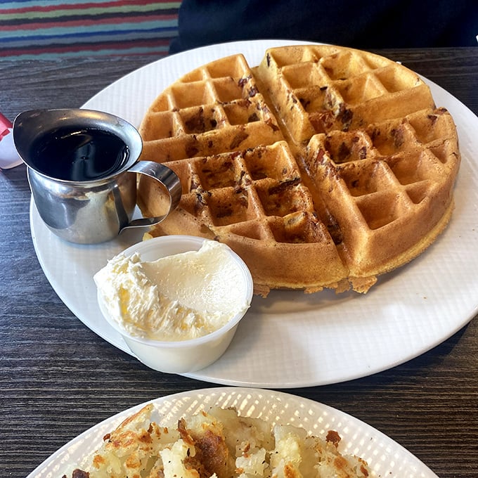 A waffle that's achieved the impossible trifecta: golden-crisp exterior, fluffy interior, and enough structural integrity to support rivers of syrup.