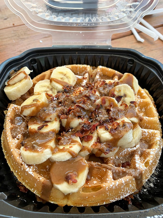 This isn't just a waffle&mdash;it's a Belgian canvas masterfully painted with banana slices, bacon, and peanut butter maple sauce that would make Elvis weep.