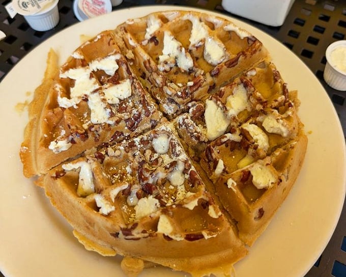 These golden waffles with butter and pecans aren't just breakfast &ndash; they're an edible love letter to morning indulgence that would make Leslie Knope weep with joy.