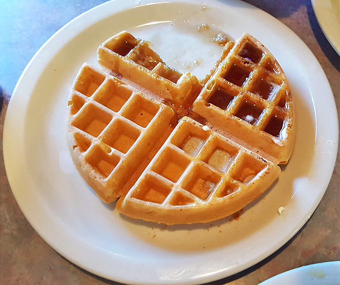 Golden waffle perfection that makes you question why anyone bothers with avocado toast. Those crispy squares are practically begging for maple syrup.