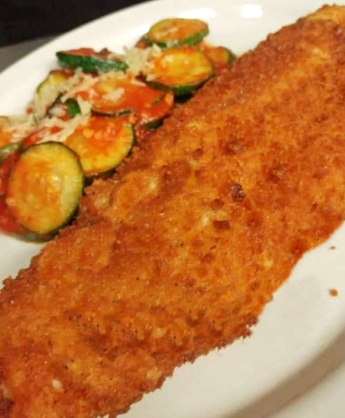 Golden-crusted perfection meets fresh vegetables&mdash;this walleye doesn't just swim to your plate, it practically dives into the culinary hall of fame. 