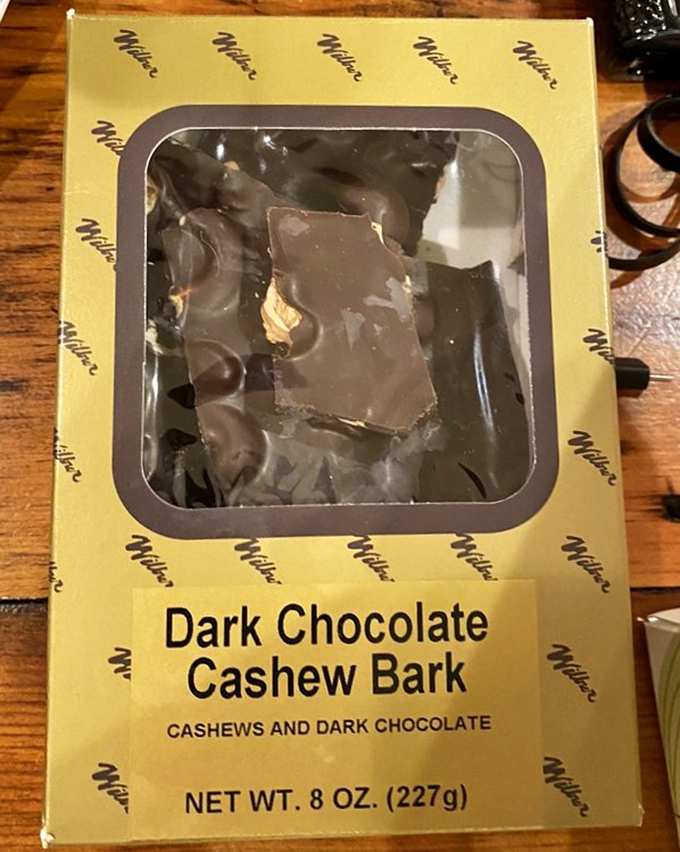 Dark chocolate cashew bark packaged with care. The perfect marriage of crunch and smooth&mdash;like the chocolate equivalent of a great jazz duo.