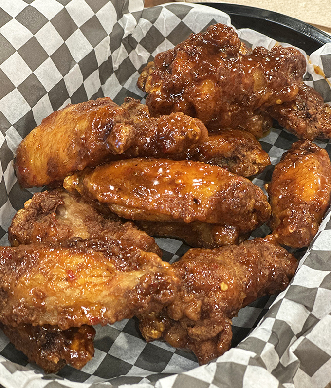 Saucy wings glistening with potential, waiting to transform your ordinary Tuesday into a flavor festival worth remembering.