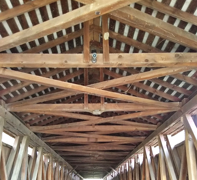 Look up! The intricate wooden truss system isn't just architectural eye candy&mdash;it's engineering genius that's kept this structure standing since Lincoln was campaigning.