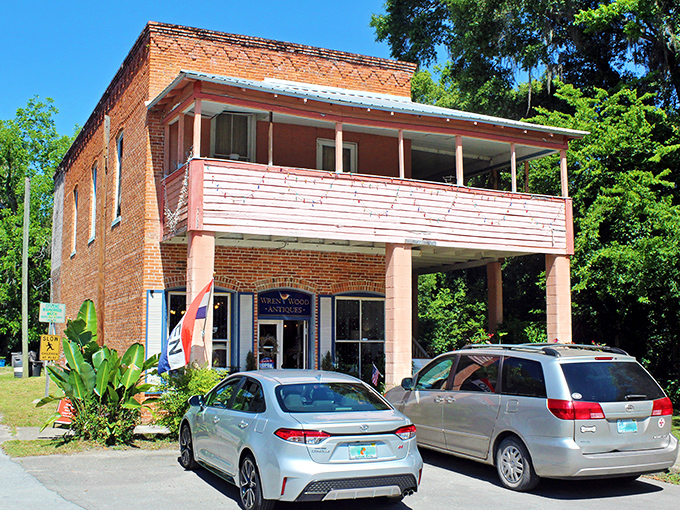 Two-story brick buildings with balconies and storefronts &ndash; the kind of place where treasure hunters spend hours sifting through history, one antique at a time.