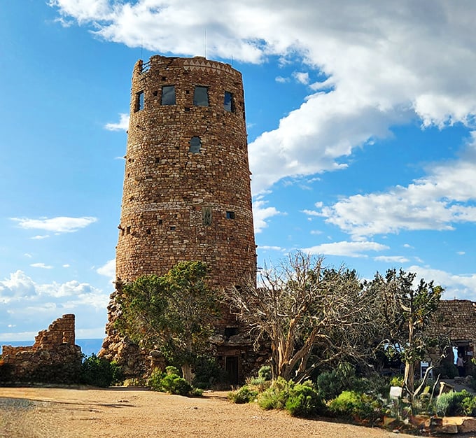 The tower emerges from the landscape like a medieval castle that took a wrong turn and found paradise instead.