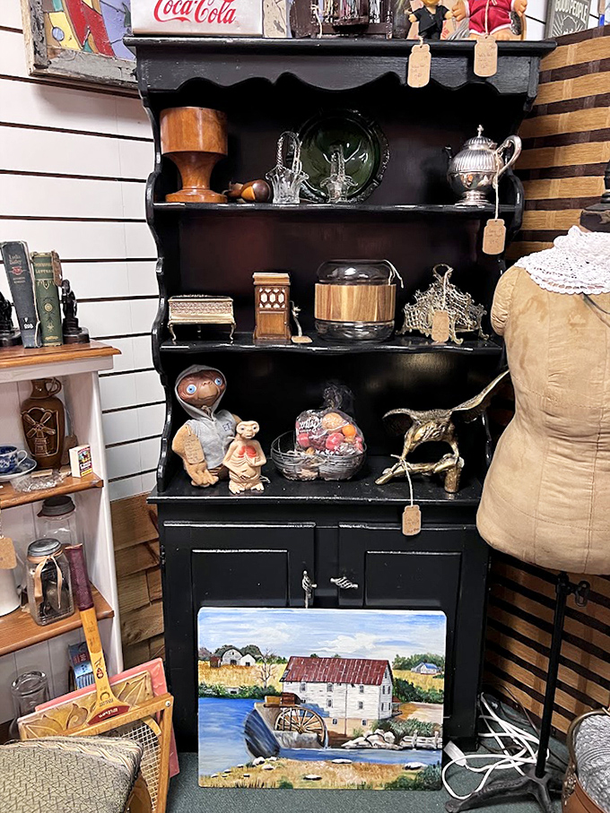 This black hutch doesn't just display treasures&mdash;it tells stories. That watermill painting transforms a simple cabinet into a countryside escape.