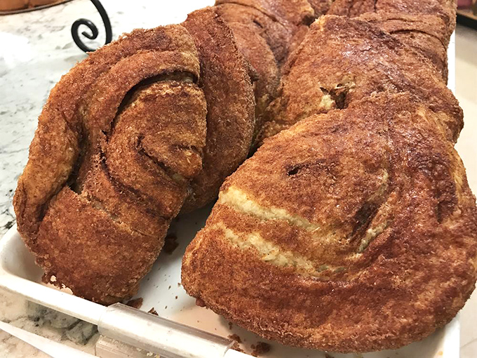 Apple flips that would make your grandmother weep with joy &ndash; golden pastry spirals hiding sweet, cinnamon-kissed fruit treasures within.