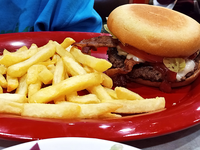 This isn't just a burger&mdash;it's a declaration of beef independence. Those fries look like they're auditioning for a supporting actor award.