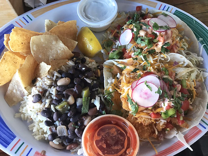 These tacos aren't wearing designer clothes—they're dressed in fresh ingredients that let the blackened hogfish be the star of the show.