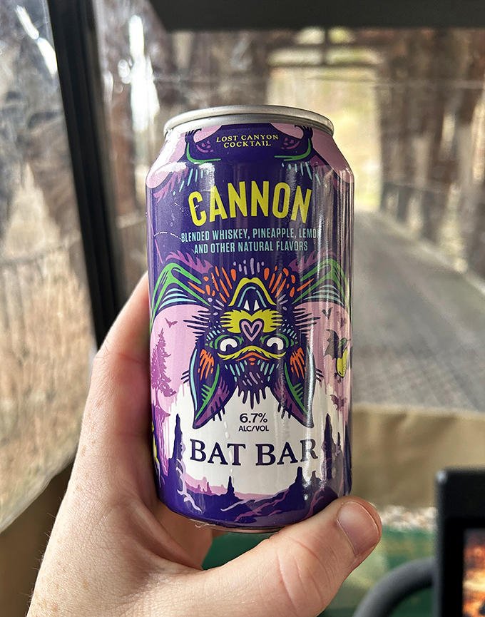 The Cannon cocktail blends whiskey, pineapple, and lemon in a vibrant can that matches the atmosphere.