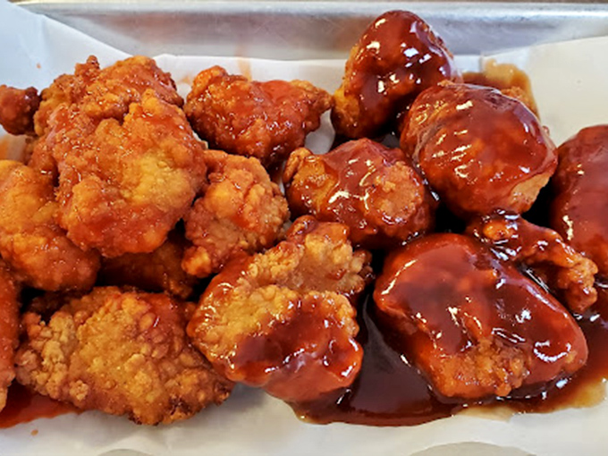 Wing perfection comes in two flavors at 73 Grill – gloriously crispy original and saucy sweet heat. The hardest decision you'll make all day.