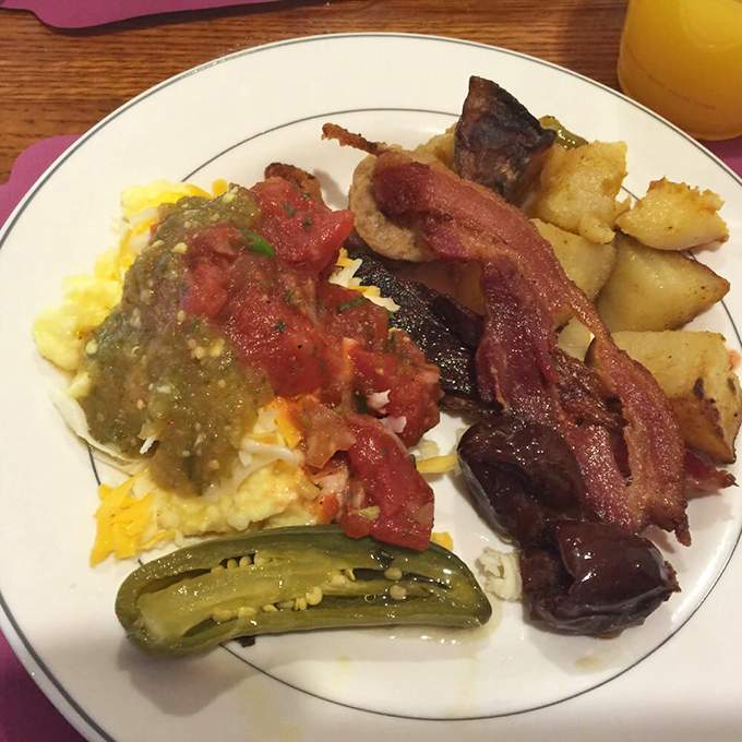 Breakfast plate nirvana: Where eggs, bacon, and potatoes perform a harmonious dance that might just bring tears to your eyes.