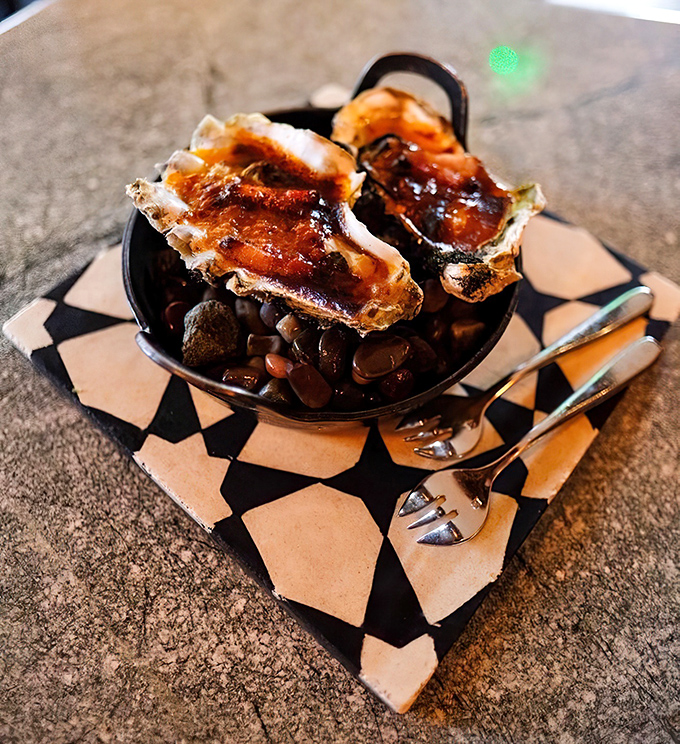 Oysters on the half-shell, transformed by fire and imagination. These aren't your grandfather's oysters&mdash;unless your grandfather was a culinary genius with excellent taste.