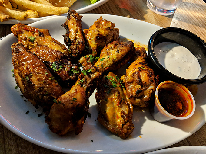 Portuguese buffalo wings: proof that cultural fusion isn't just for fancy restaurants. These crispy, sauce-slathered beauties would make both Lisbon and Buffalo proud.