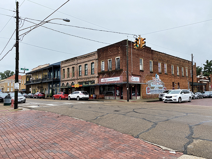 The corner buildings anchor Jefferson's historic district like old friends who've weathered storms together for over a century.