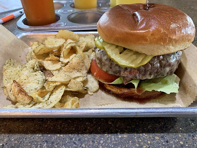 When a burger looks this photogenic, you know the kitchen takes pride in every layer of delicious construction work.