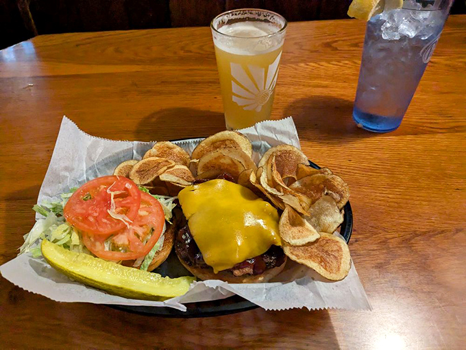 Behold: the burger that launched a thousand road trips. That melty cheese blanket isn't just topping&mdash;it's tucking that perfect patty in for a nap it'll never take.