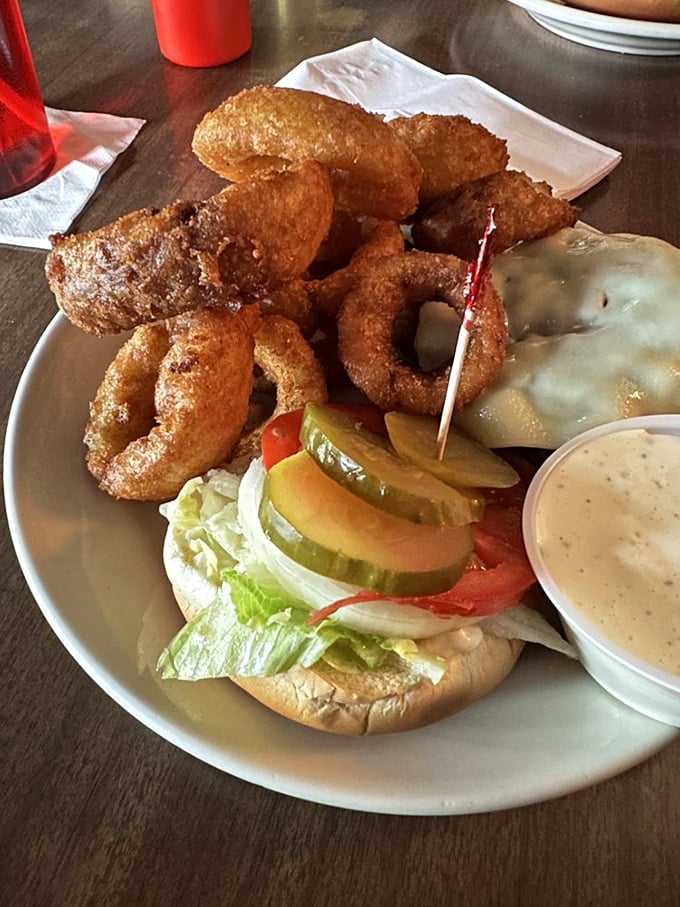 The burger-to-onion-ring ratio here is what mathematicians call "perfect harmony." Add a cold beer, and you've discovered the equation for an ideal Cincinnati afternoon.
