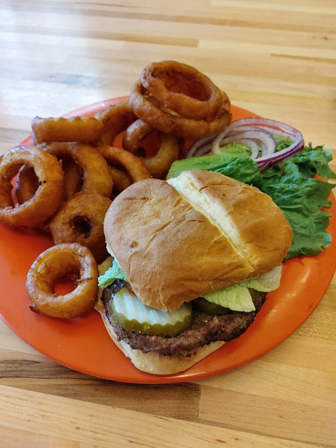 A proper burger doesn't need truffle aioli or gold flakes&mdash;just honest beef, fresh toppings, and onion rings that shatter like your diet resolutions.