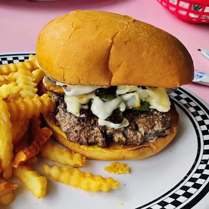 A burger that doesn't need fancy aioli or artisanal nonsense&mdash;just honest ingredients stacked with the confidence of a diner that knows its worth.