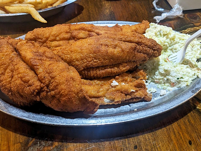 Catfish fillets dressed in their Sunday best, ready to convert even the staunchest seafood skeptics.
