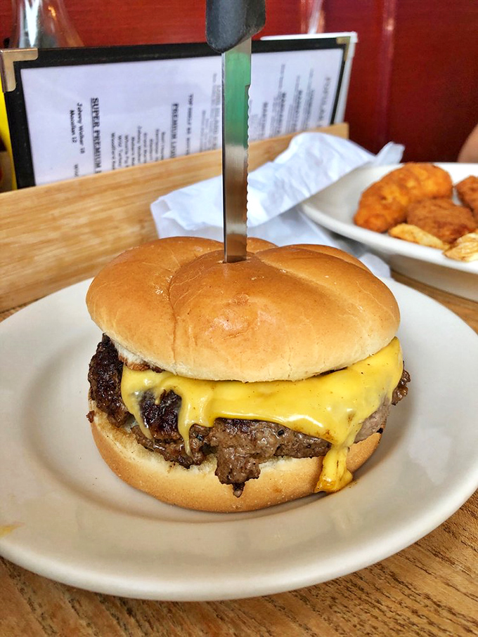 The cheeseburger that launched a thousand cravings&mdash;perfectly charred exterior, melty American cheese, and a bun that knows its supporting role.