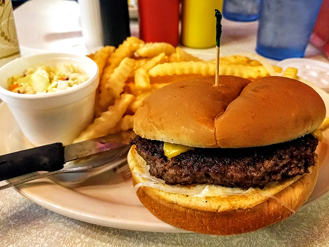 The star of the show&mdash;a cheeseburger that proves simplicity is the ultimate sophistication, with a char that whispers of summer cookouts. 