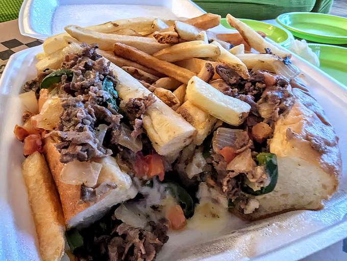 This isn't just a cheesesteak sandwich&mdash;it's Philadelphia's soul served on bread. The fries aren't a side; they're essential supporting characters.