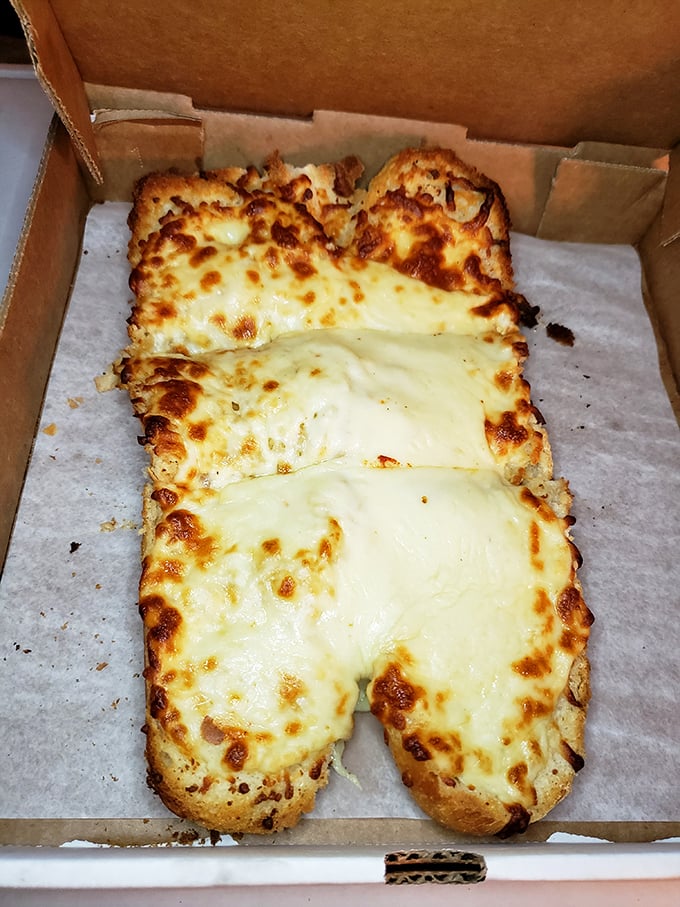 The famous cheesy bread: where melted perfection meets carb heaven and nobody's counting calories.