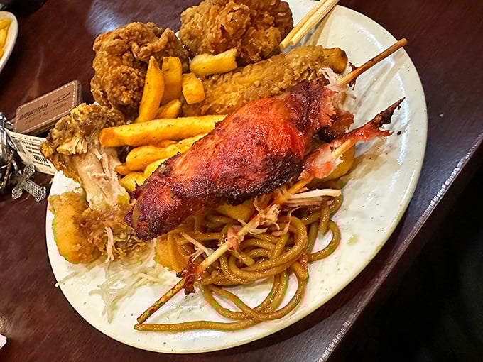 The ultimate buffet plate of champions&mdash;fried chicken, BBQ, noodles, and fries sharing real estate like friendly neighbors who don't mind touching.