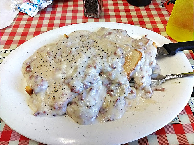 Fluffy biscuits smothered in creamy sausage gravy &ndash; comfort food that could make your grandmother weep with joy.