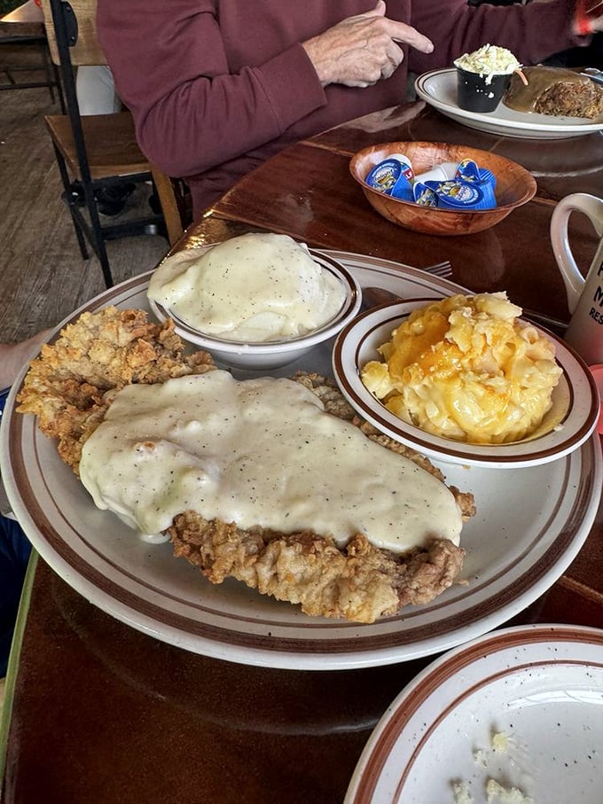 Country fried steak with gravy so good you'll want to write it poetry, alongside mac and cheese that deserves its own fan club.