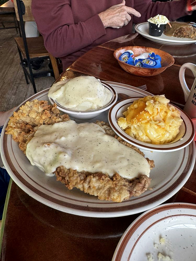 Country fried steak with gravy so good you'll want to write it poetry, alongside mac and cheese that deserves its own fan club.
