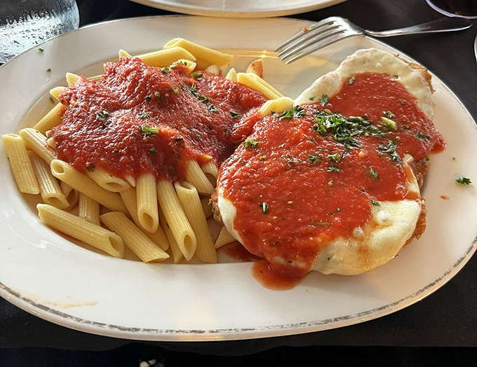 Golden chicken parmigiana that's crispier than a perfect autumn day and twice as satisfying to experience.