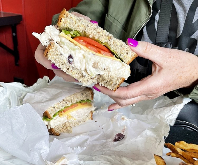 Sometimes the simplest pleasures hit hardest - this chicken salad sandwich delivers homestyle satisfaction in every single bite.