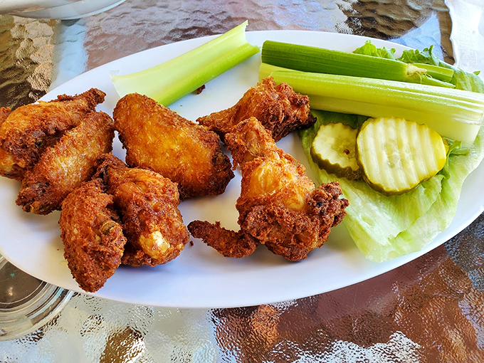 Wings that don't need a sporting event as an excuse to be devoured, served with the obligatory celery sticks that nobody actually eats.