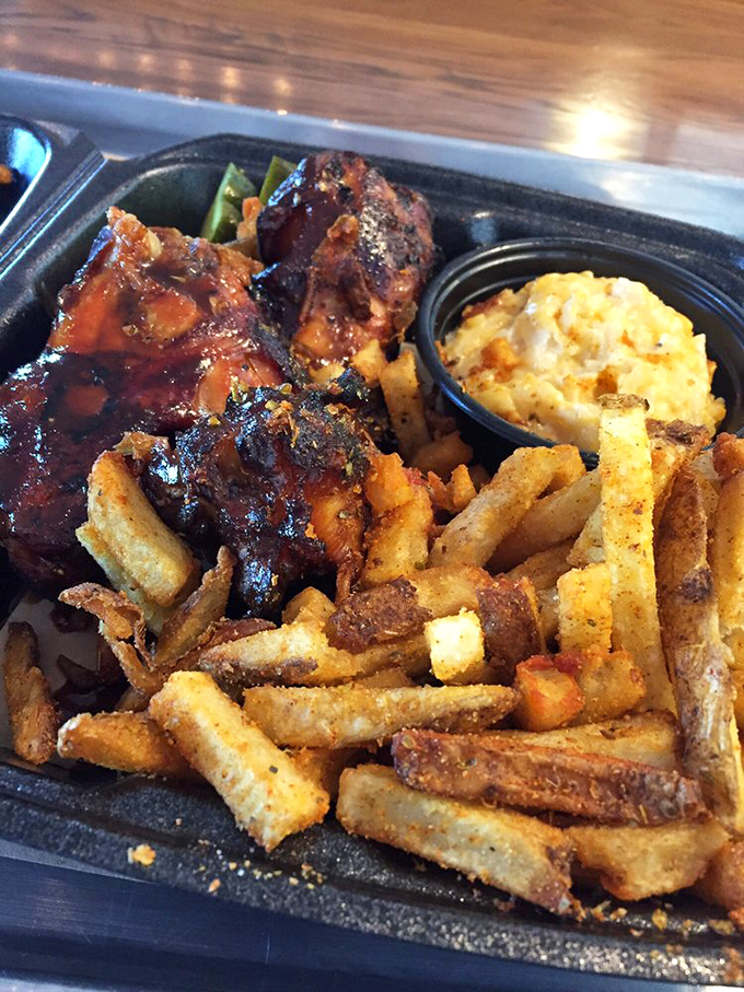 These ribs aren't just falling off the bone&mdash;they're practically volunteering to jump onto your plate alongside those perfectly golden fries.