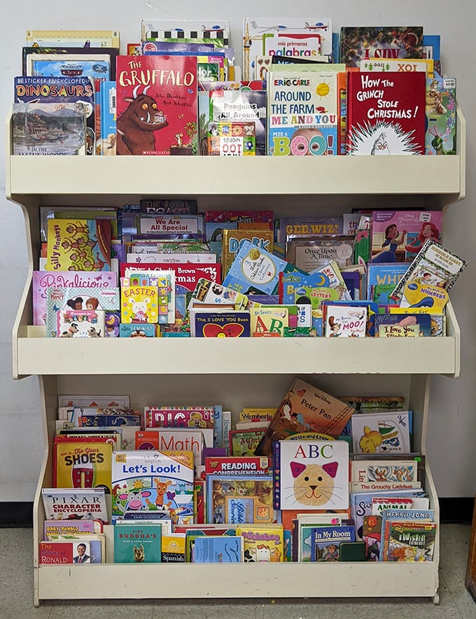 Children's books stacked like colorful time machines, ready to transport a new generation to worlds of Gruffalos and Grinches.