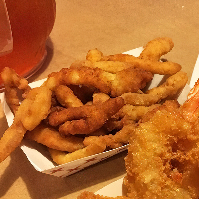 Clam strips nestled in their paper-lined basket&mdash;crispy, tender morsels that disappear faster than your resolution to eat light today.