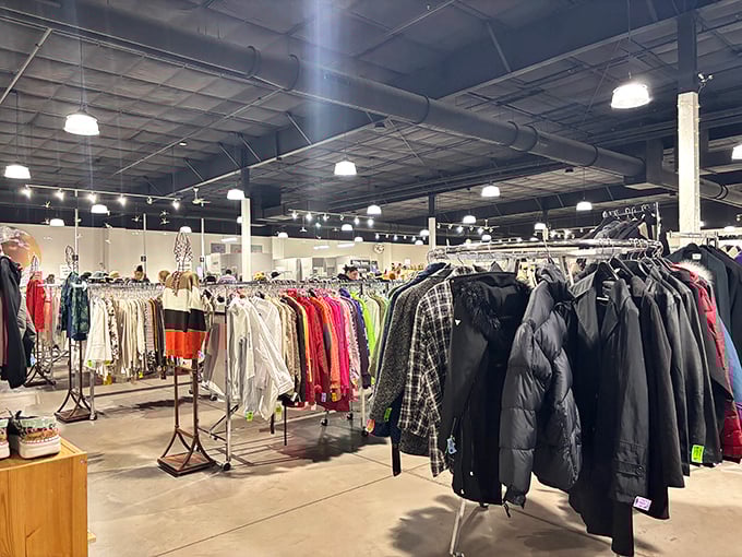 Winter coats and summer jackets hang in perfect formation, like a well-dressed army ready to march into someone's wardrobe.