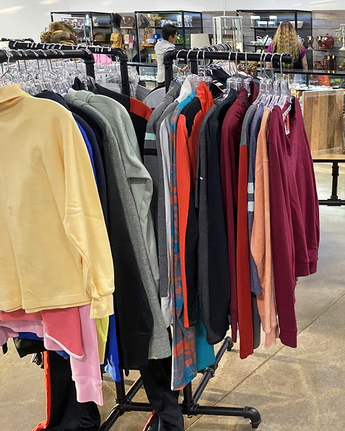 Racks of colorful clothing await their next adventure, like actors in the wings ready for their second act on a different stage.