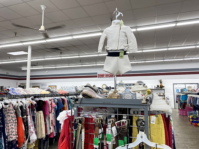 Fashion's time capsule, where yesterday's trends hang hopefully. That pristine white ensemble might just be someone's perfect summer statement piece.