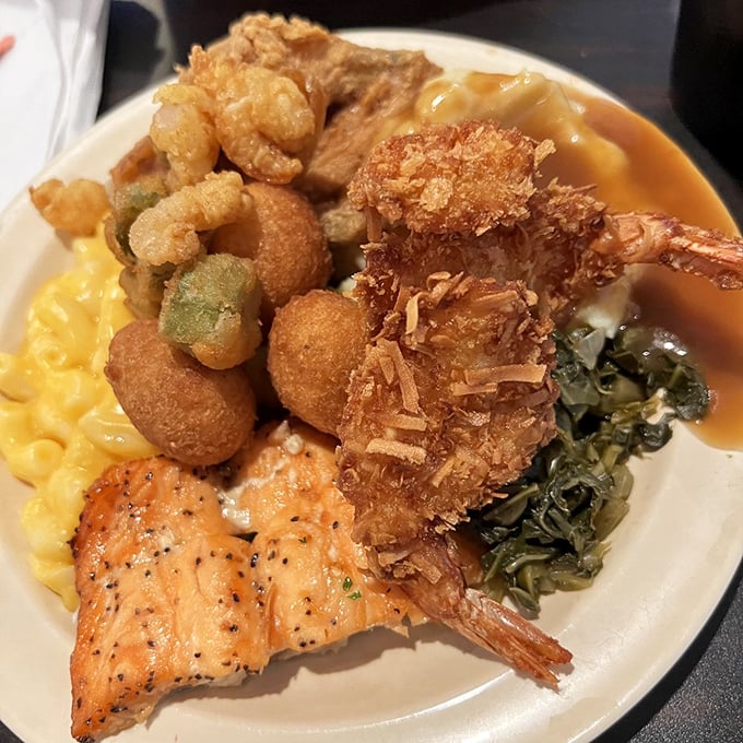 A plate that tells a delicious story&mdash;crispy coconut shrimp, perfectly grilled salmon, and sides that don't know they're supposed to be supporting characters.