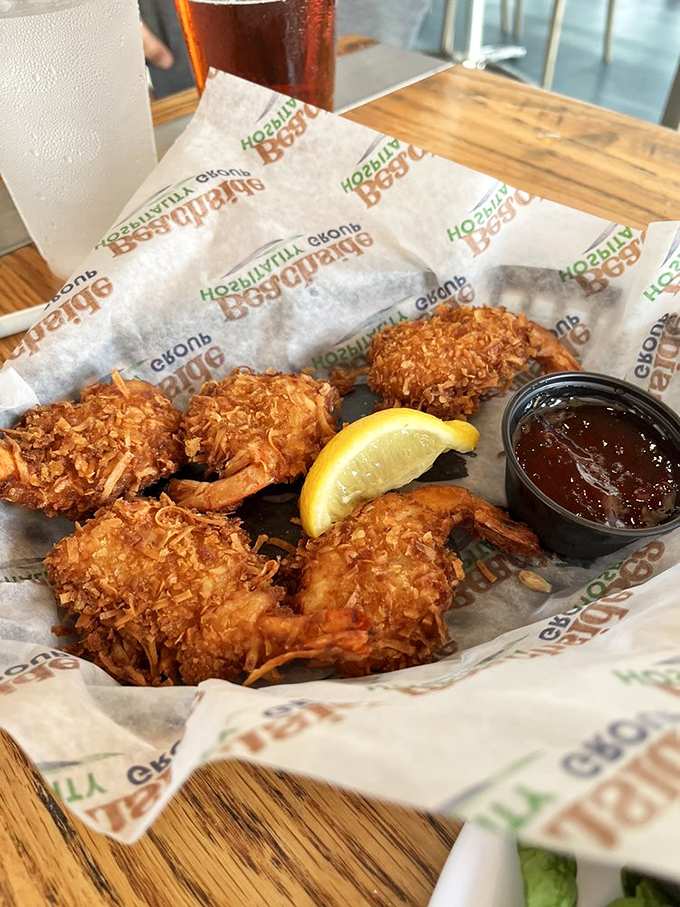 Coconut shrimp that would make even the most dedicated health nut say, "Diet starts tomorrow." The golden crunch is audible three tables away.