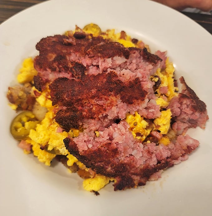 Corned beef hash that doesn't come from a can? Revolutionary! Each bite offers the perfect marriage of crispy edges and savory meat.