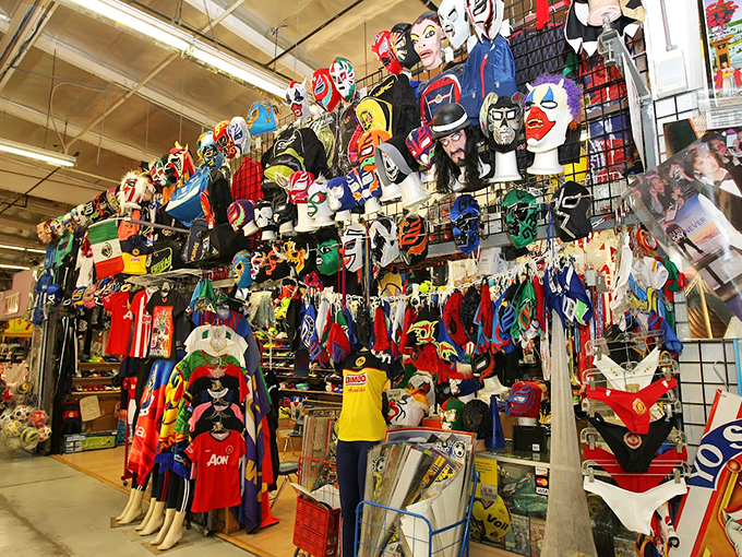 Superhero costumes hang like colorful sentinels&mdash;because sometimes adulting requires a cape, mask, and secret identity discount shopping powers.