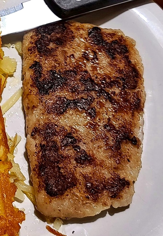 Country fried steak with the kind of char marks that would make a grill master weep with joy.