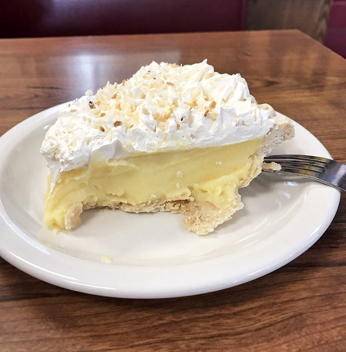 Cream pie that would make your grandmother both proud and jealous. That topping is a cloud of sweet nostalgia.
